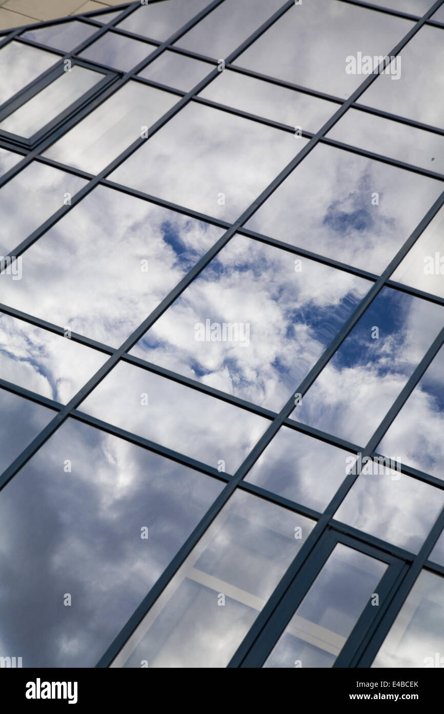 windows of skyscraper with reflections Stock Photo - Alamy