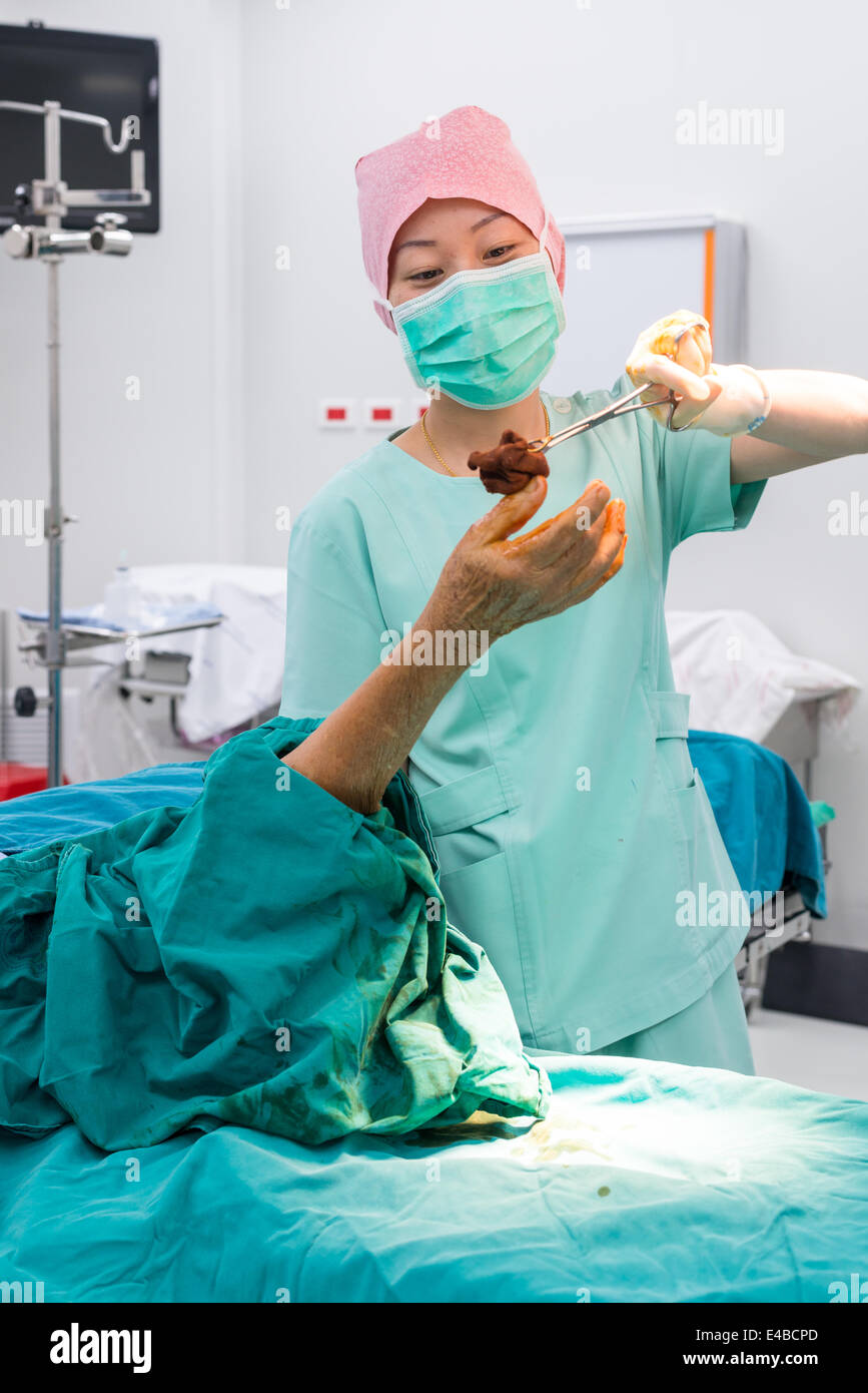 Scrub nurse use cleaning solution paint all forearm and arm prepare for ...