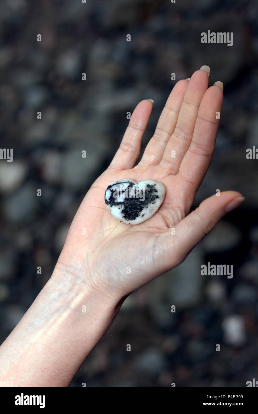 Stone granite hand Stock Photo - Alamy