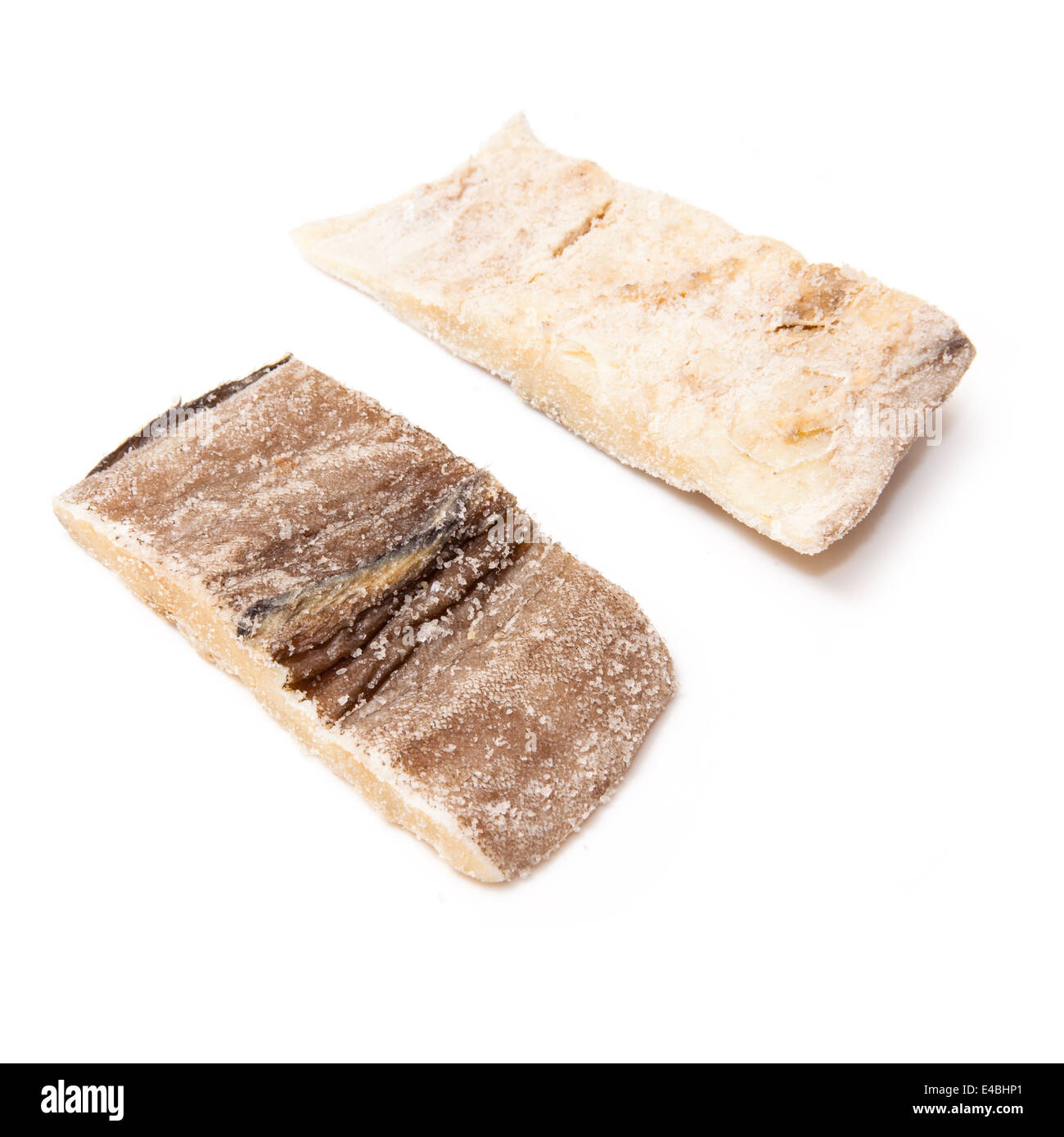 Pieces of salt cod fish isolated on a white studio background Stock ...
