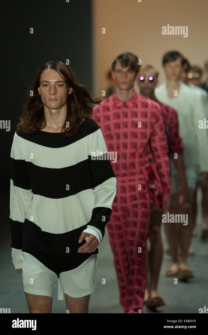 Berlin, Germany. 8th July, 2014. Models are seen on the runway during ...