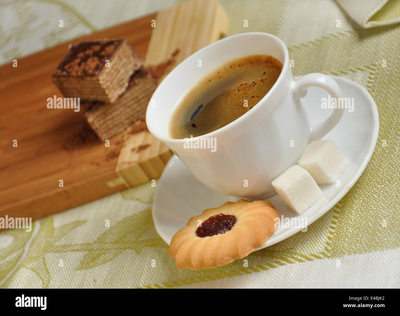 Morning coffee with biscuits and cake Stock Photo - Alamy