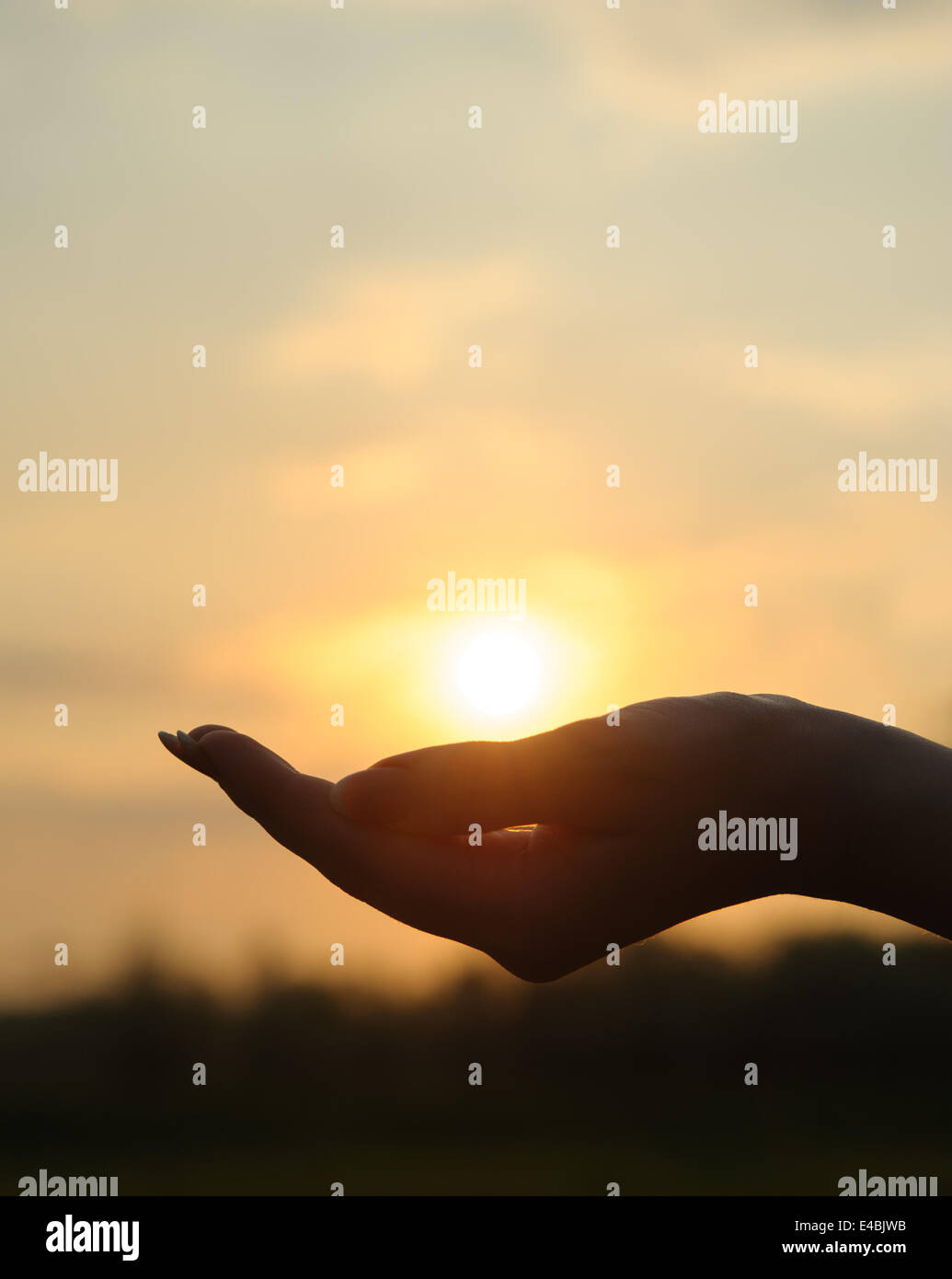 The sun in hand Stock Photo - Alamy