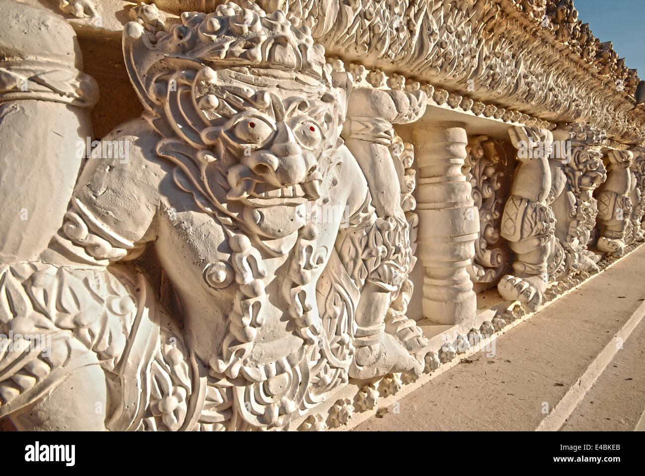 Statue the face giant at temple Stock Photo - Alamy