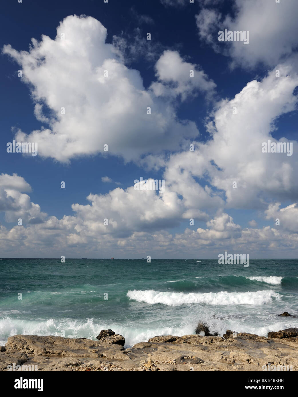 Splash of waves about coastal stones Stock Photo - Alamy