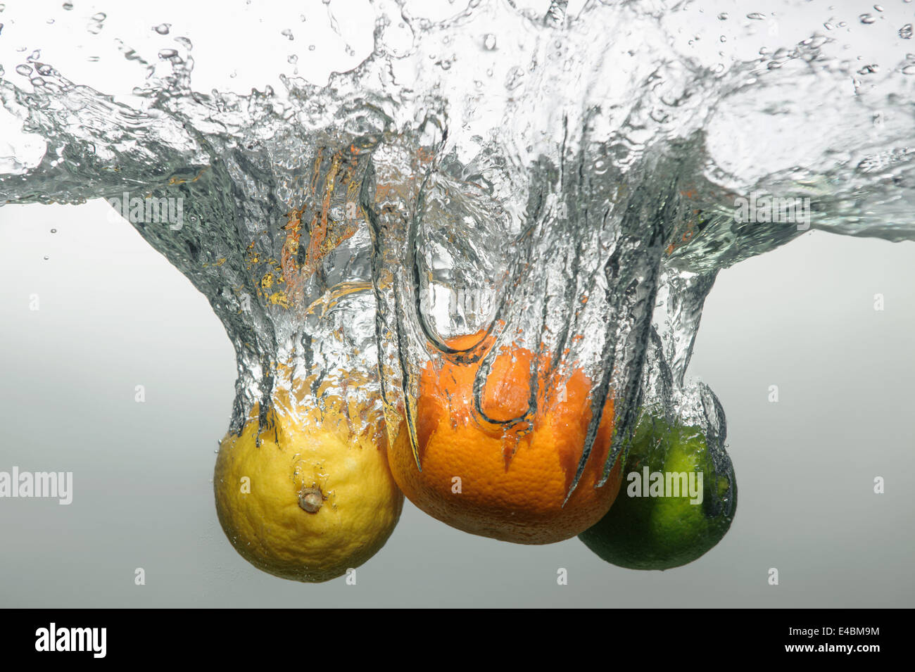 Fresh swimming fruits and vegetables Stock Photo - Alamy