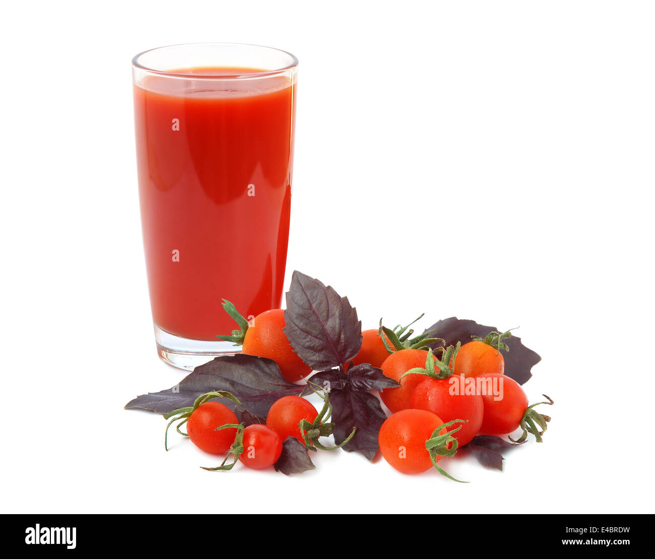Juice, basil and cherry tomatoes Stock Photo - Alamy