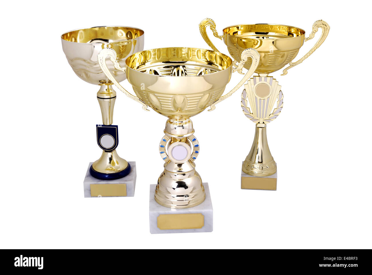 Three golden cups Stock Photo - Alamy