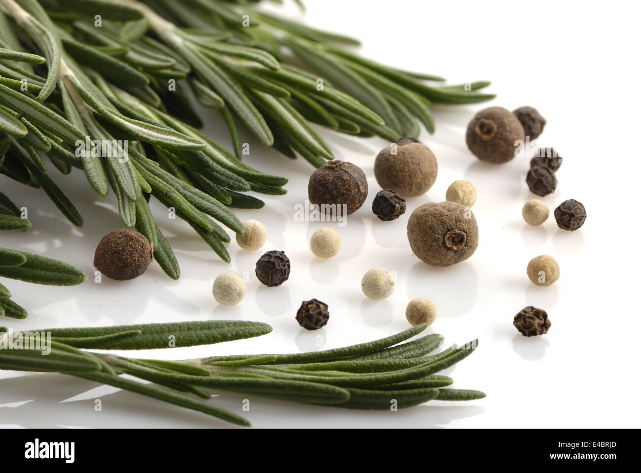 Bunch of rosemary and pepper Stock Photo - Alamy