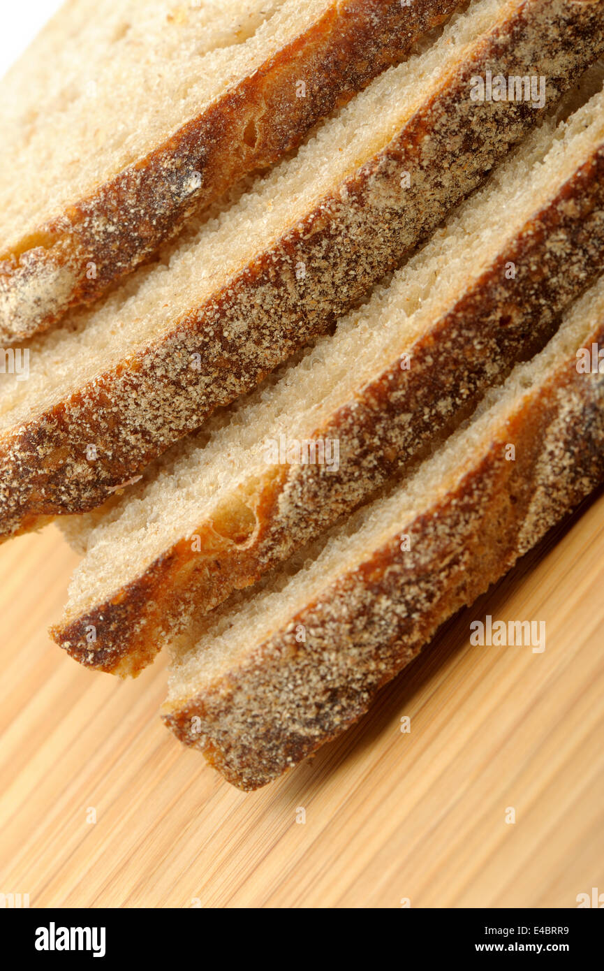 The cut bread on a chopping board Stock Photo - Alamy