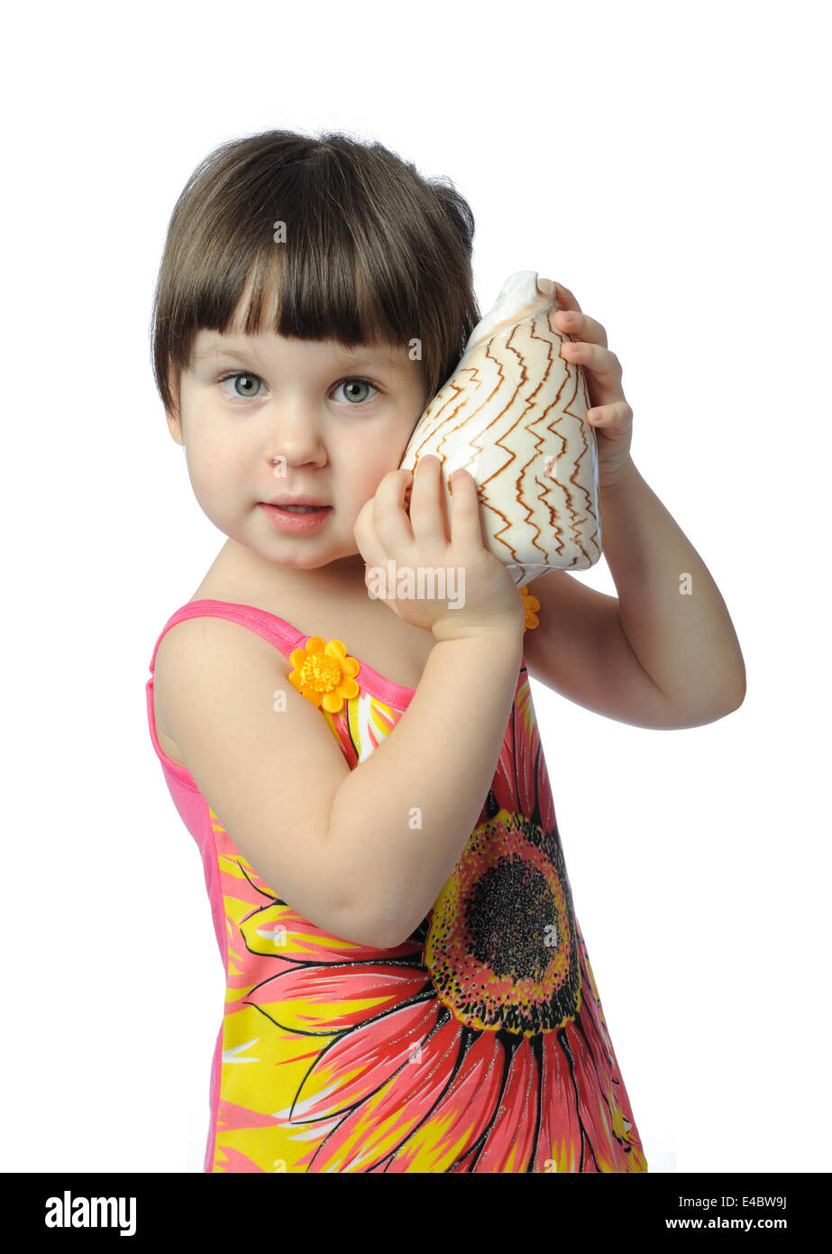 little girl with seashell Stock Photo - Alamy