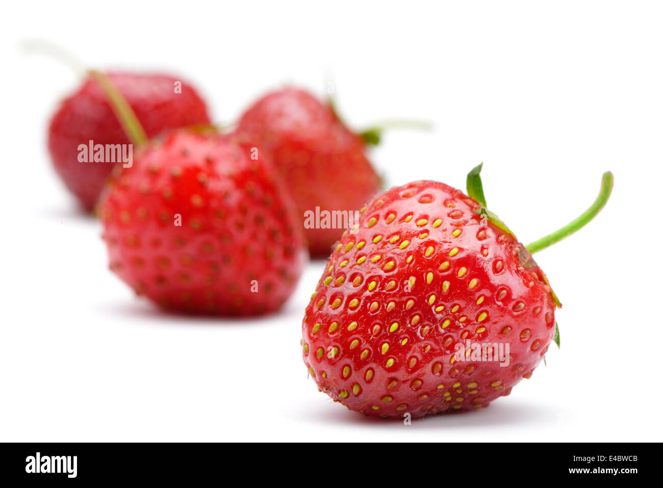 Three large strawberries hi-res stock photography and images - Alamy