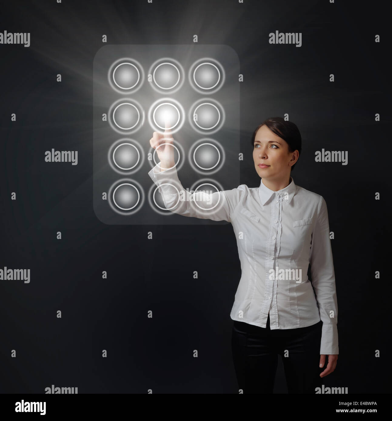 woman pushing button on dial panel Stock Photo - Alamy