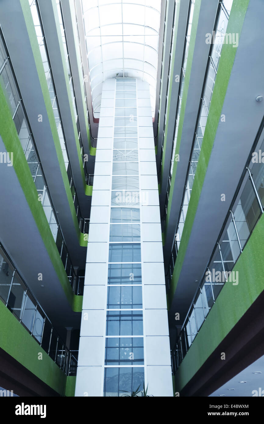 Indoor glass balconies in modern building Stock Photo - Alamy