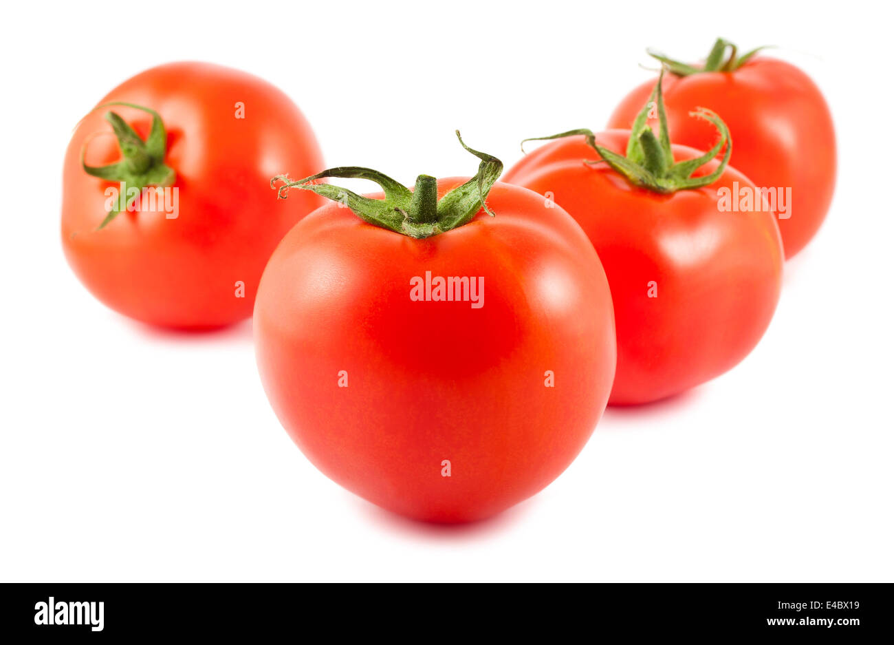 Four ripe tomatoes Stock Photo - Alamy