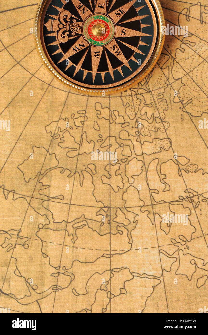 Old compass and map Stock Photo - Alamy