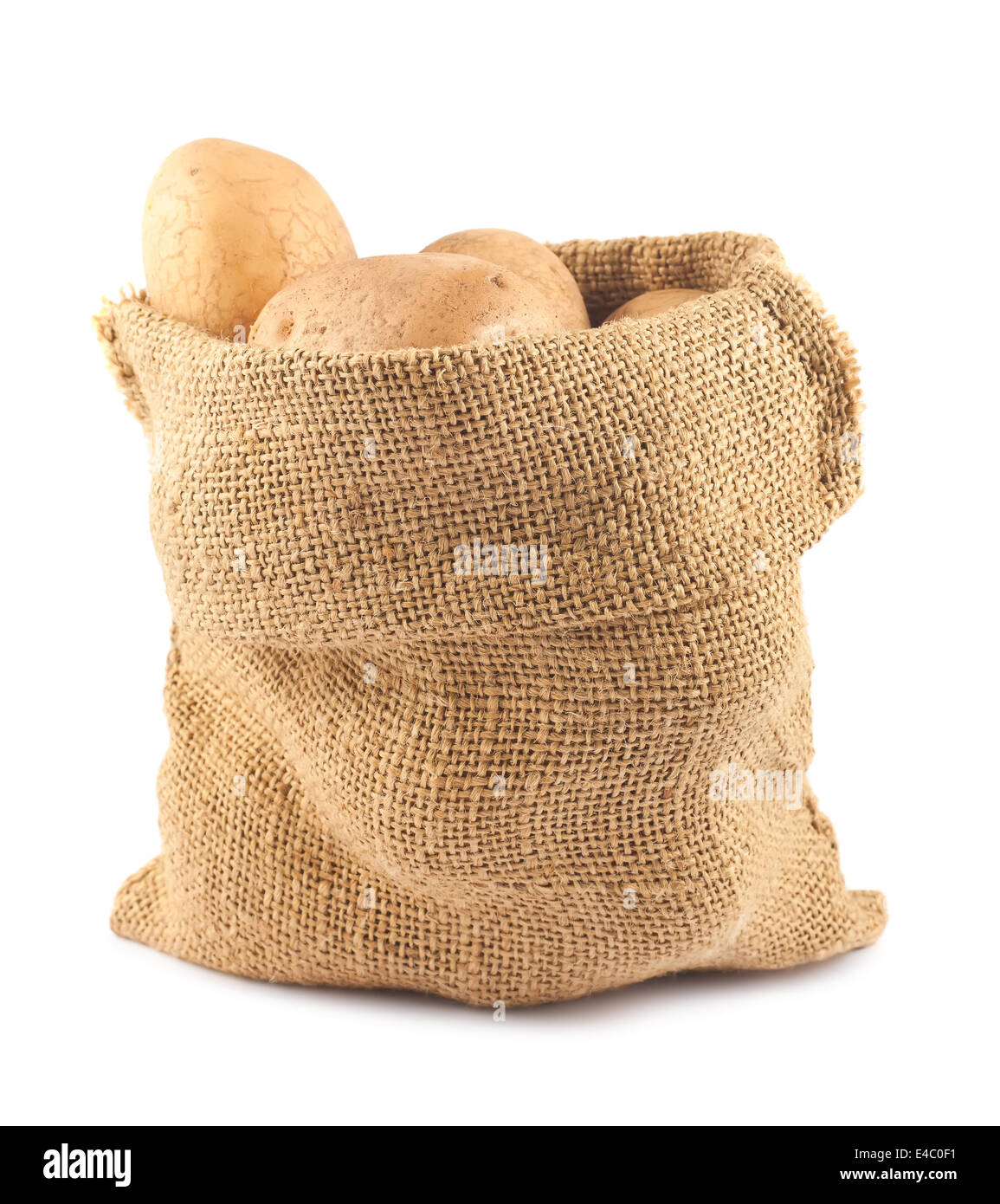 Raw potatoes in burlap sack Stock Photo - Alamy