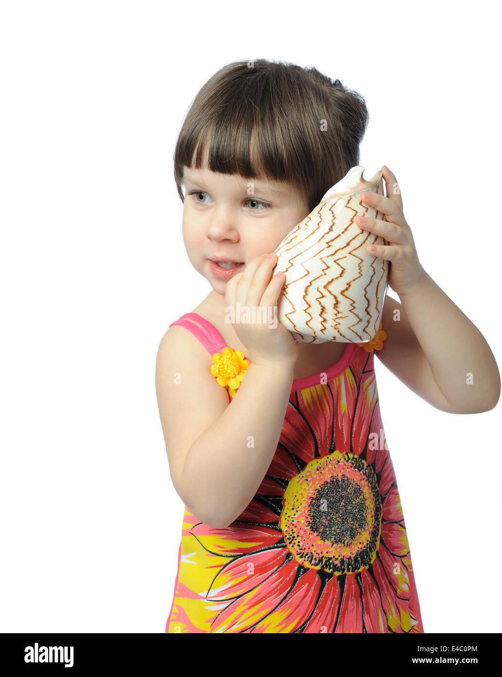 Little girl with seashell hi-res stock photography and images - Alamy