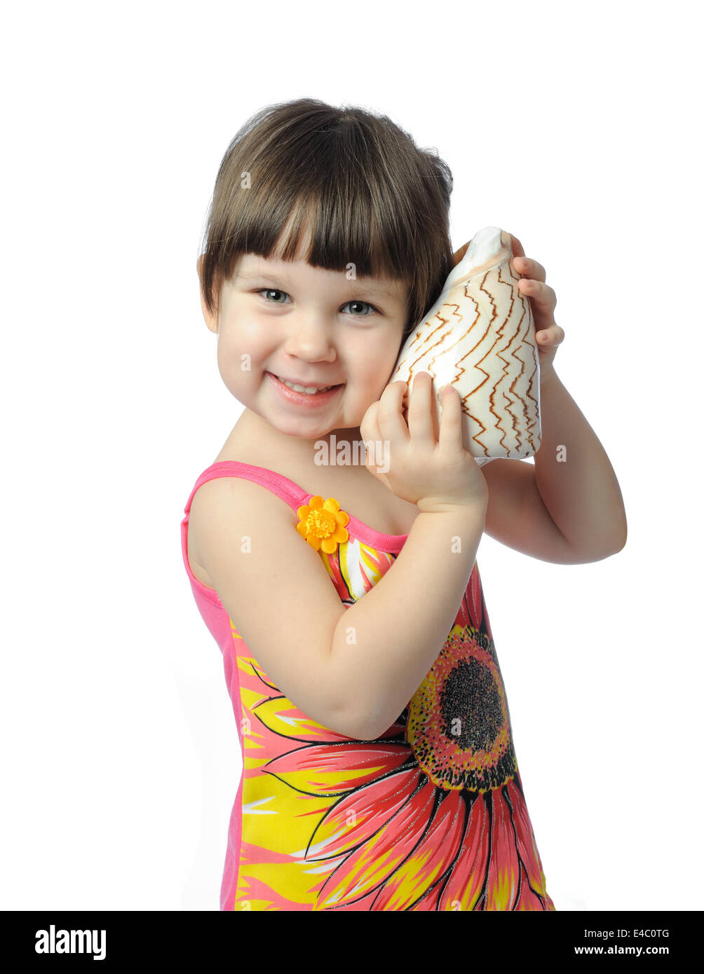 Little girl with seashell hi-res stock photography and images - Alamy