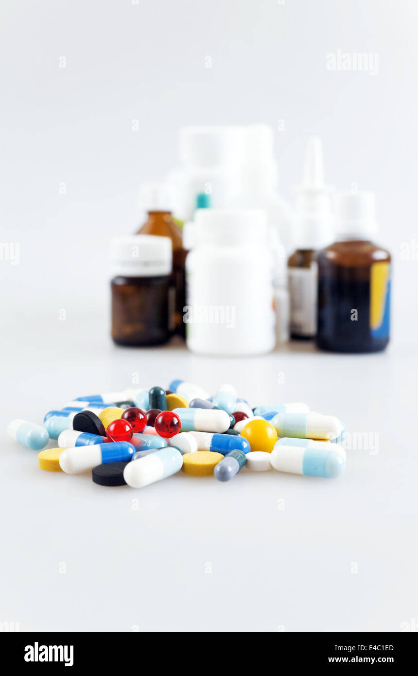 tablets and liquid drugs in bottles Stock Photo - Alamy