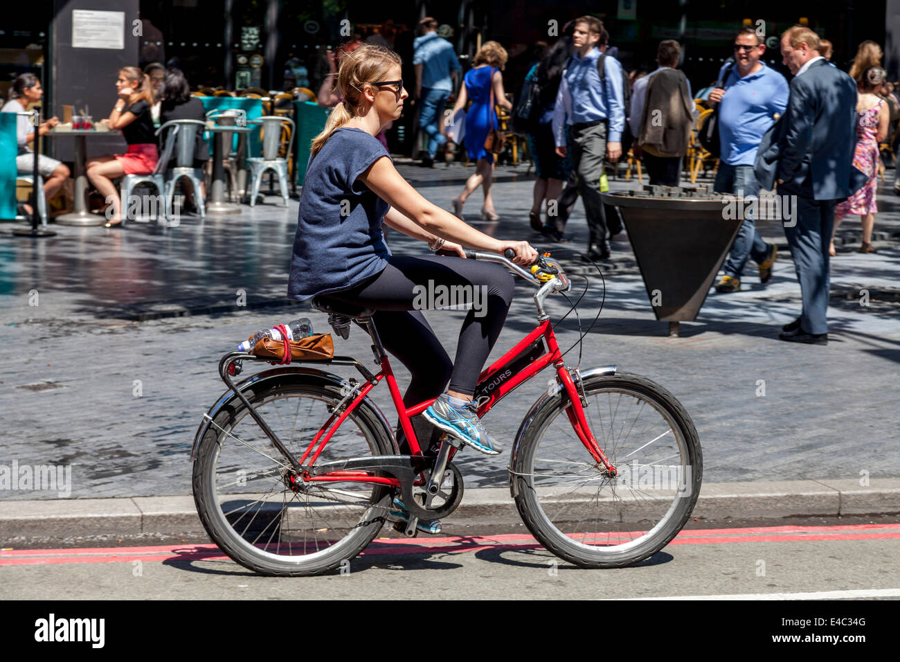 Young Woman Riding A Bicycle, London, England Stock Photo - Alamy