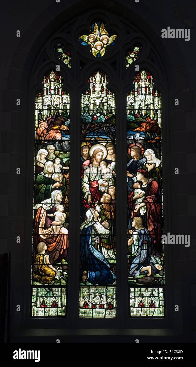 Stained glass showing Jesus with children Stock Photo - Alamy