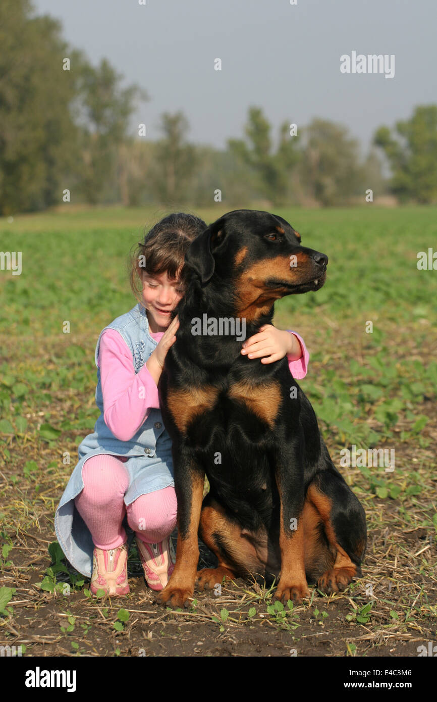 girl with Rottweiler Stock Photo - Alamy
