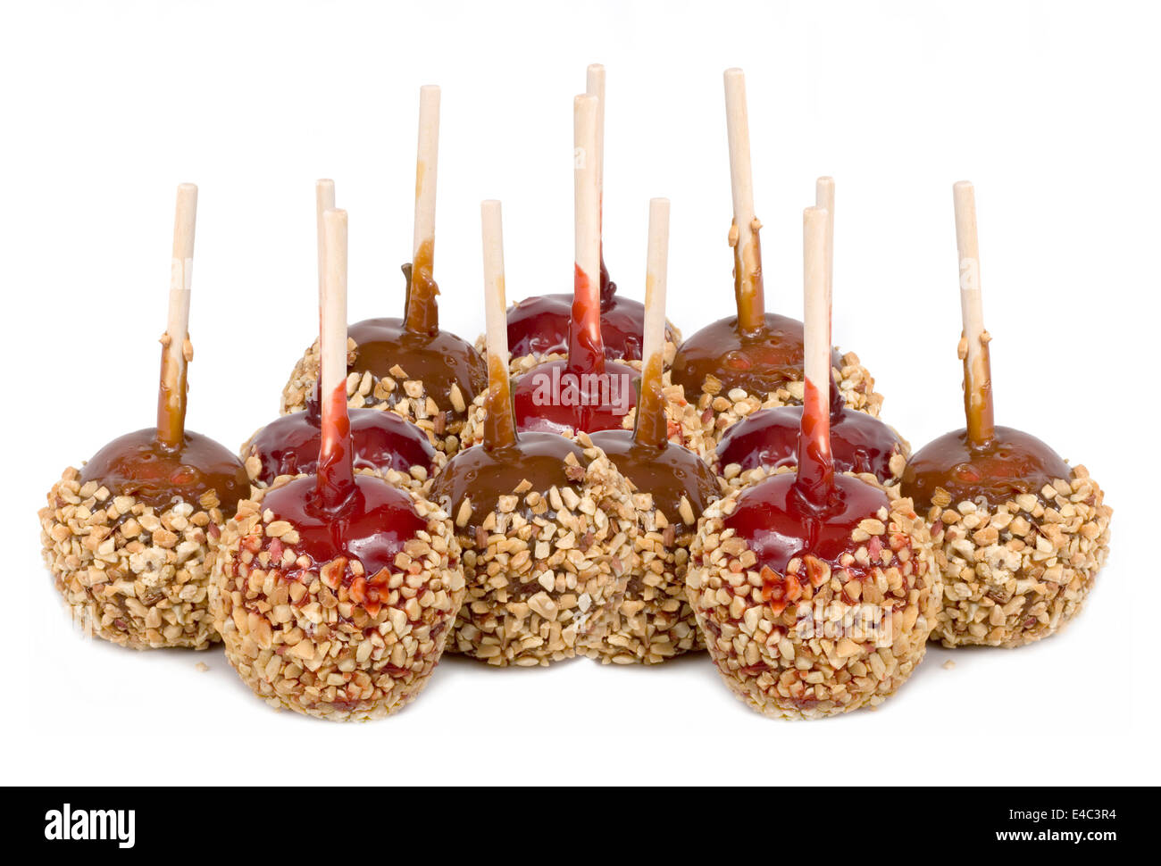 Candy apples, also known as toffee apples against a white background ...
