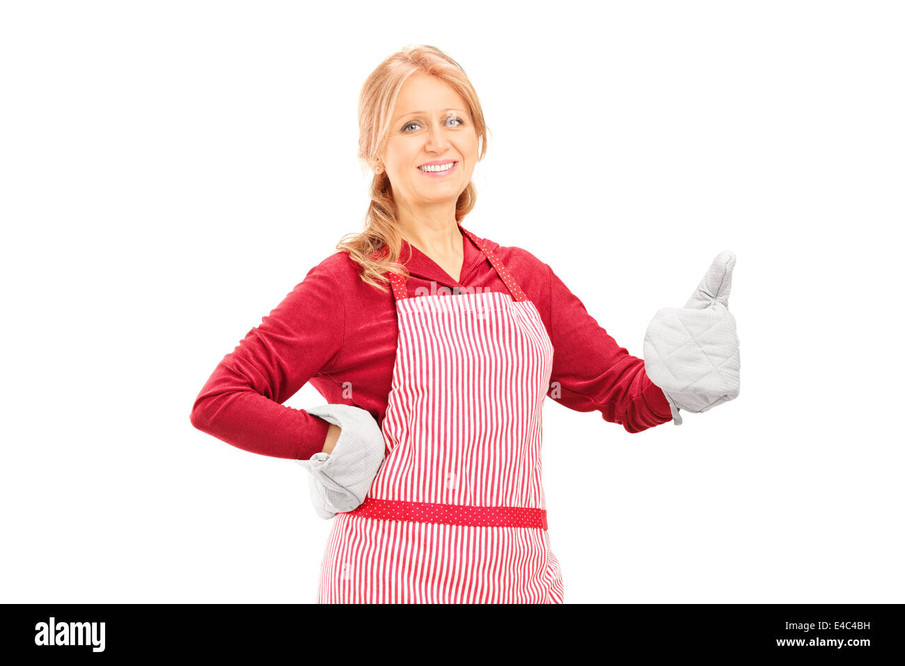 Woman with cooking gloves giving a thumb up Stock Photo - Alamy