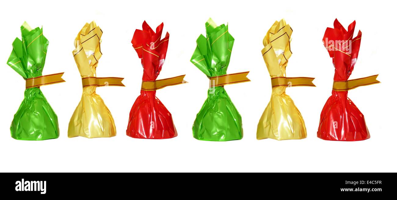 Chocolates in colorful wrappers, isolated on white Stock Photo - Alamy