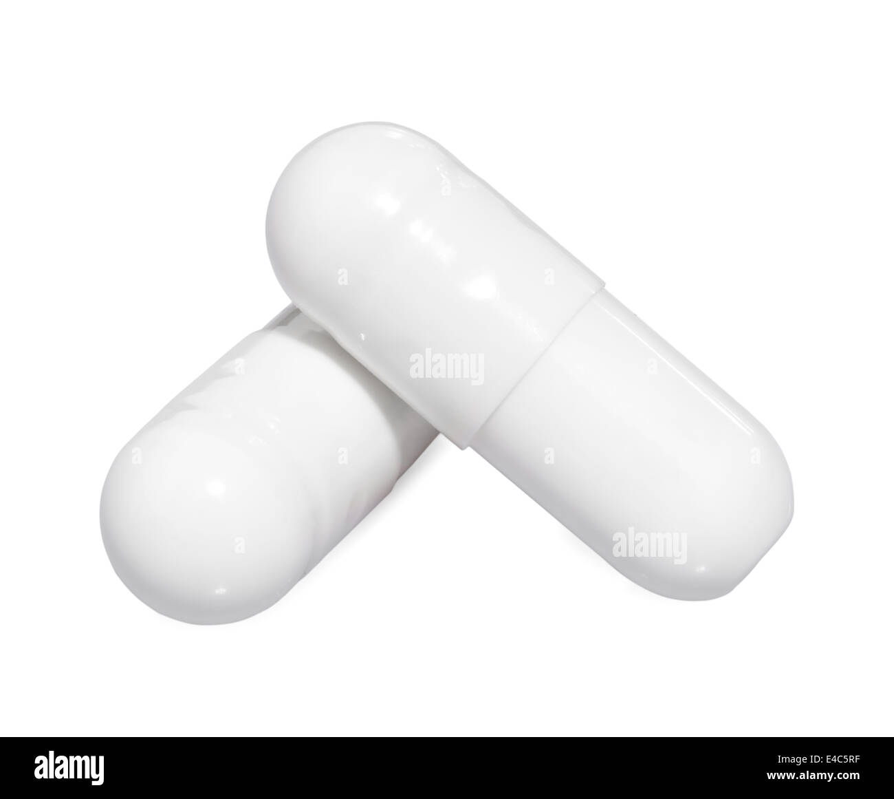 Pill on white background macro isolated Stock Photo - Alamy