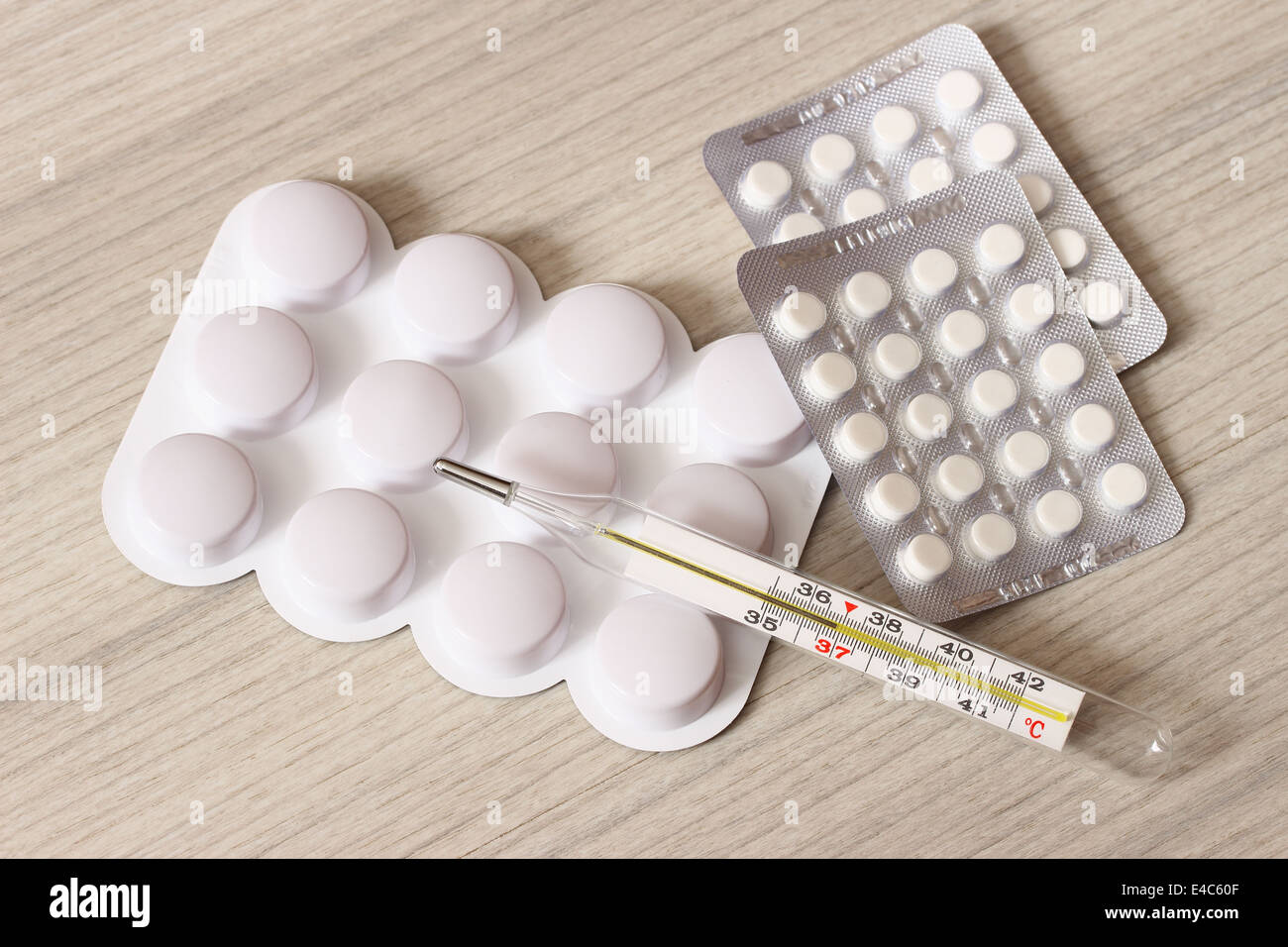 Red tablets pills with a red color hi-res stock photography and images ...