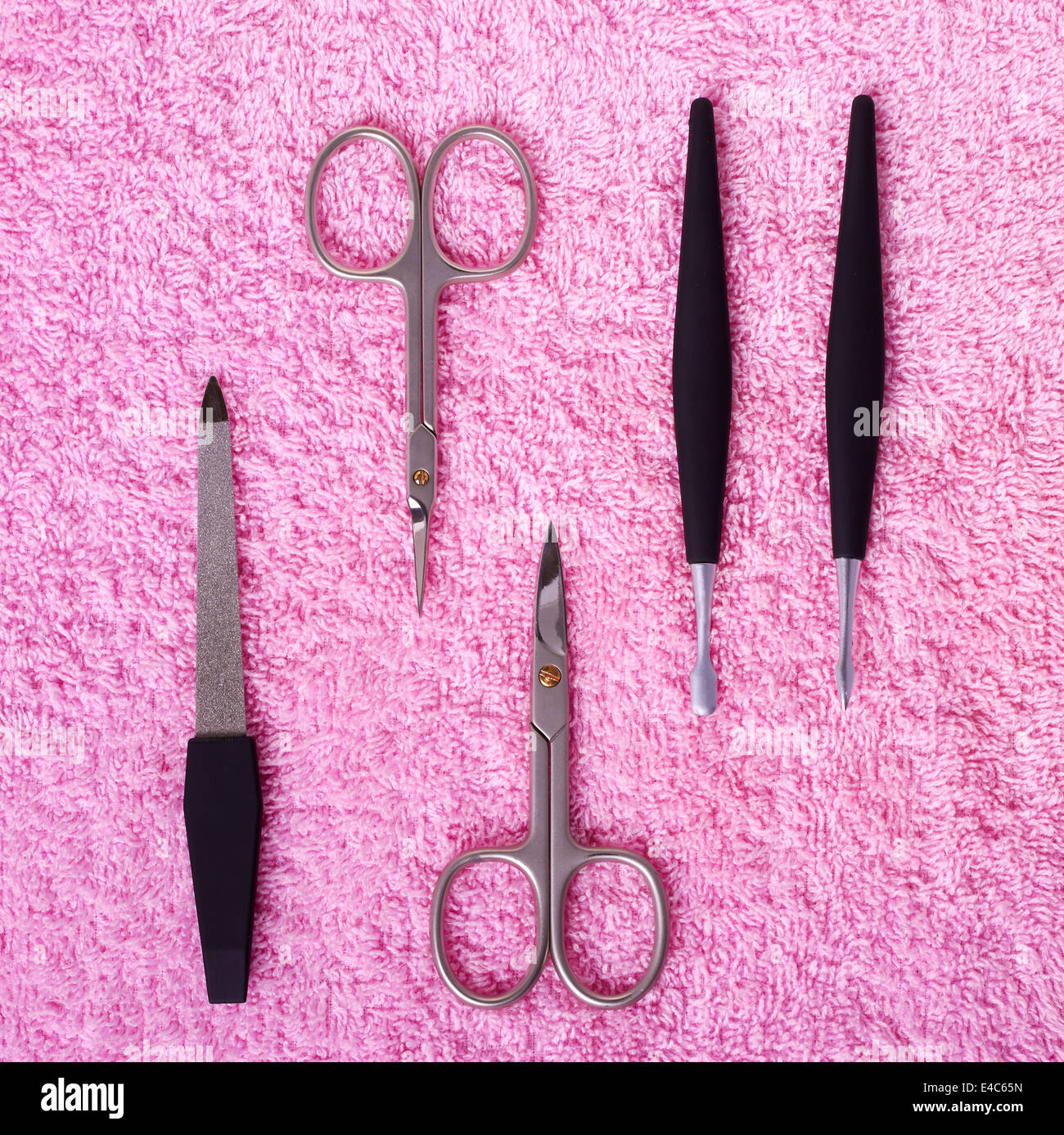 Set of manicure instruments, on a pink background Stock Photo - Alamy