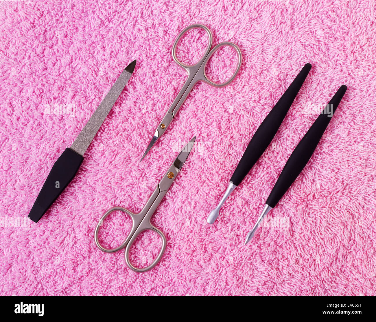 Set of manicure instruments, on a pink background Stock Photo - Alamy