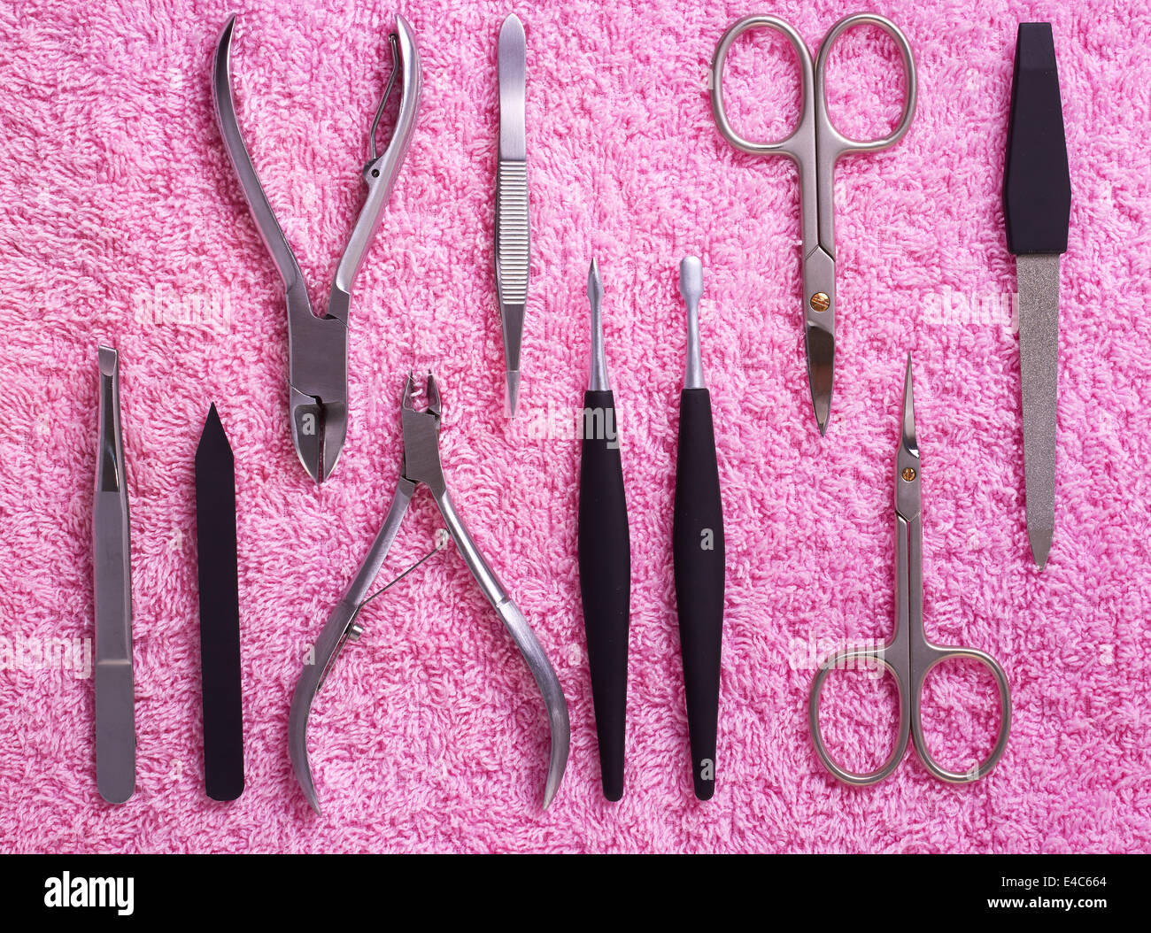 Set of manicure instruments, on a pink background Stock Photo - Alamy