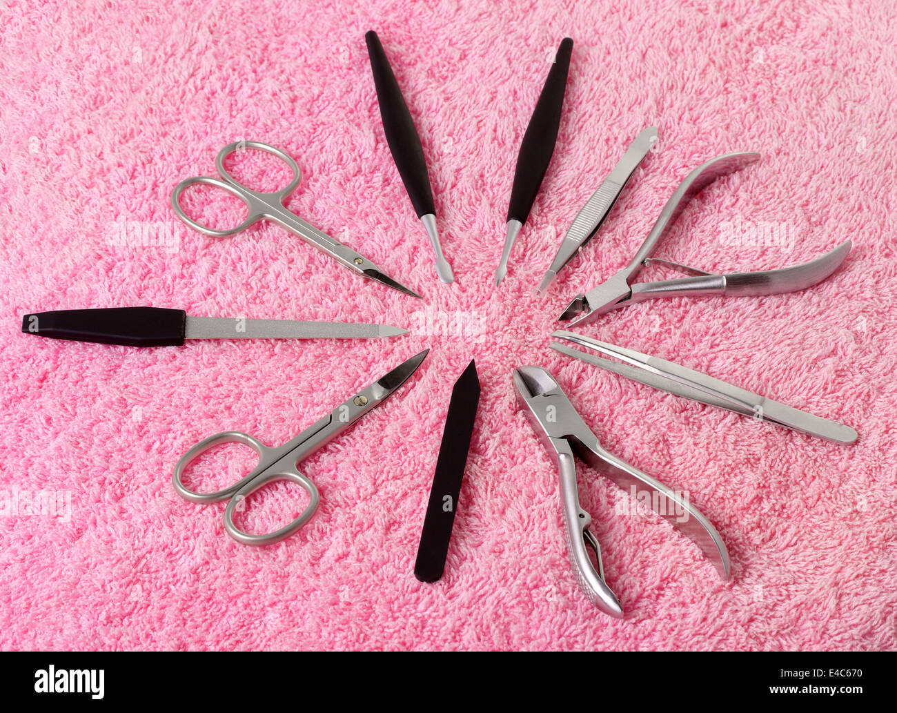 Set of manicure instruments, on a pink background Stock Photo - Alamy