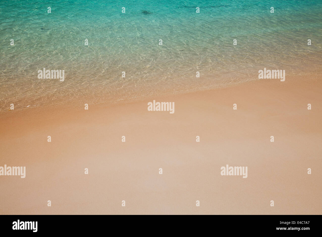 Crystal clear watersurface at the beach Stock Photo - Alamy