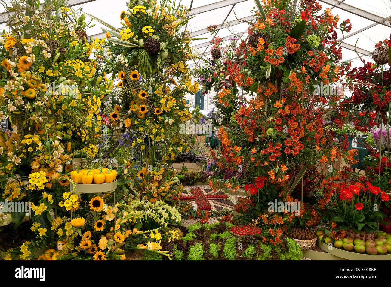 Hampton Court, UK. 8th July, 2014. Waitrose display witha a flag made ...
