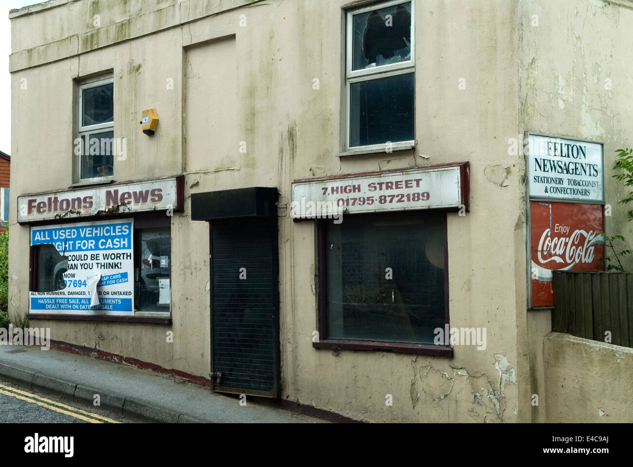 Poverty UK, boarded up shop in high street. Closed down shops Minster ...