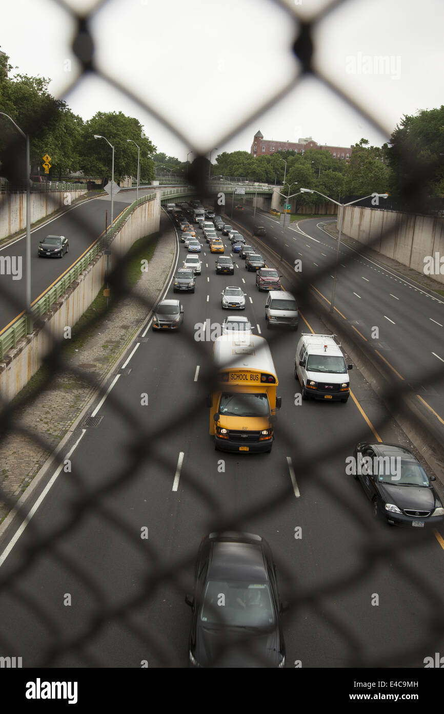 Looking through the chainlink fence on the pedestrian bridge over the ...