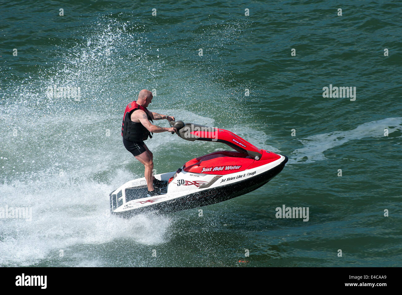 Man riding a jet ski hi-res stock photography and images - Alamy