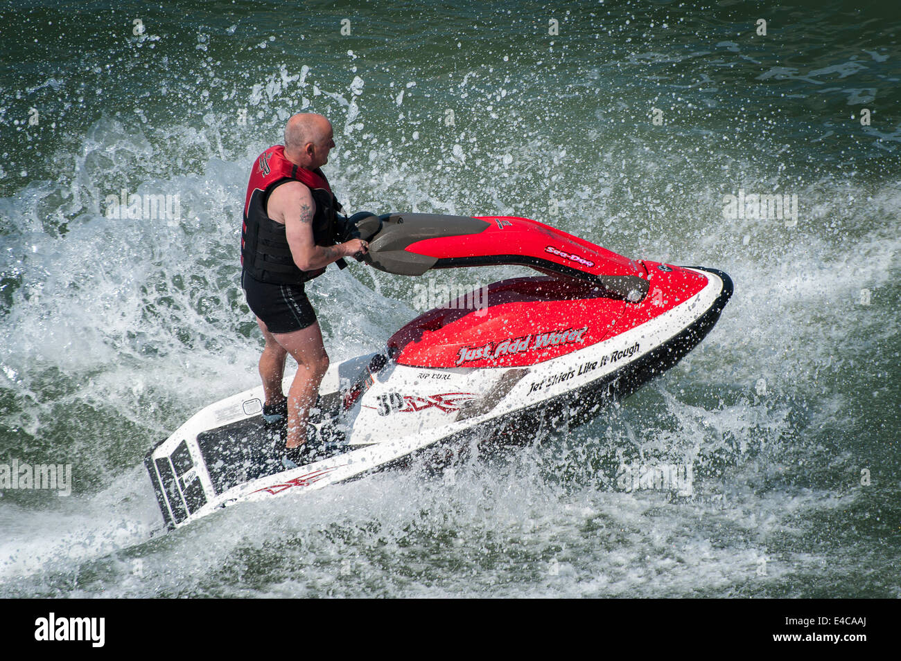 Man riding a jet ski hi-res stock photography and images - Alamy