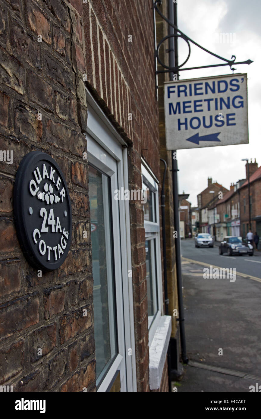 Sign showing direction to Friends Meeting House on Quaker Cottage ...