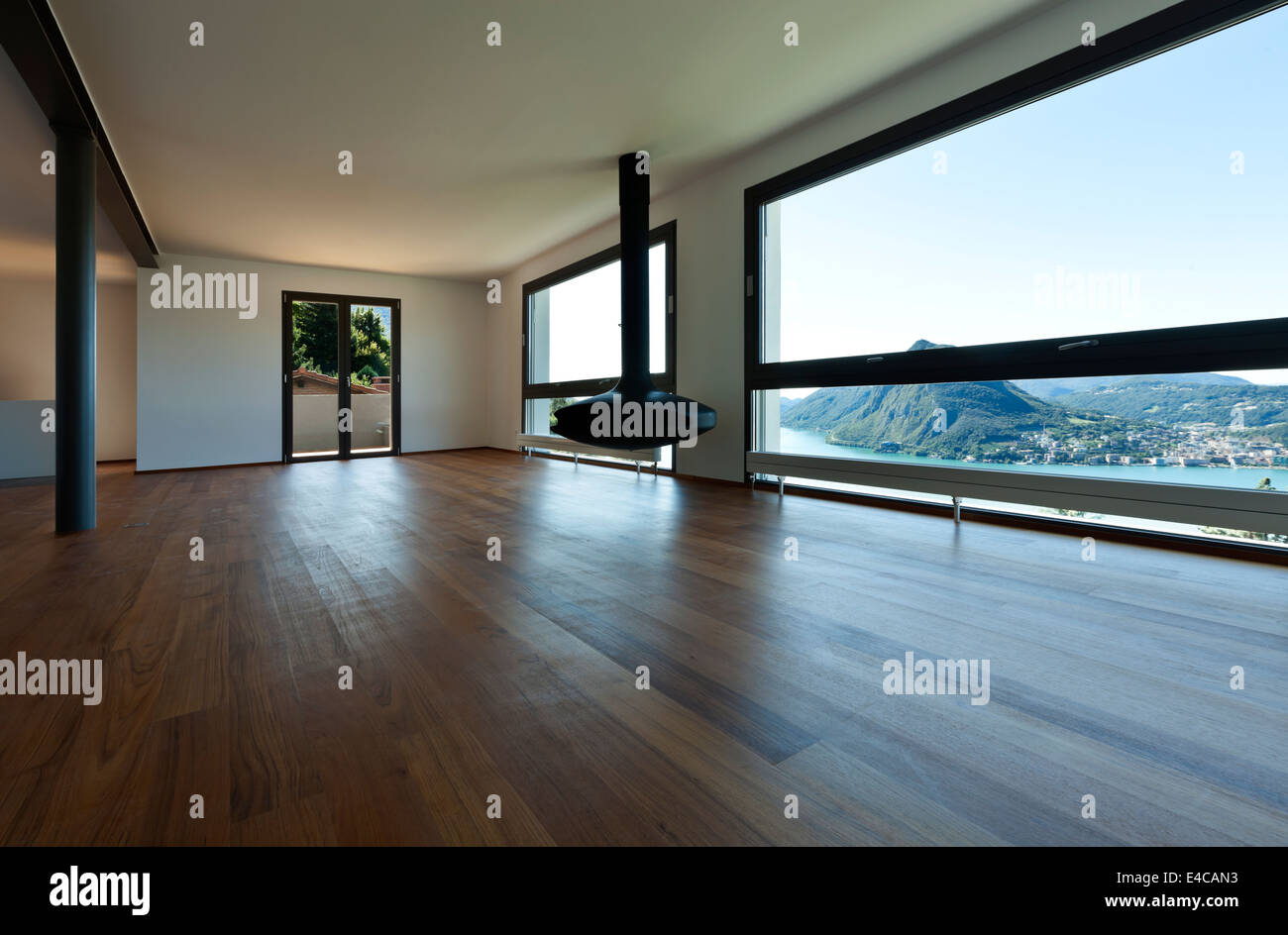 Modern apartment large living room with panoramic window Stock Photo ...