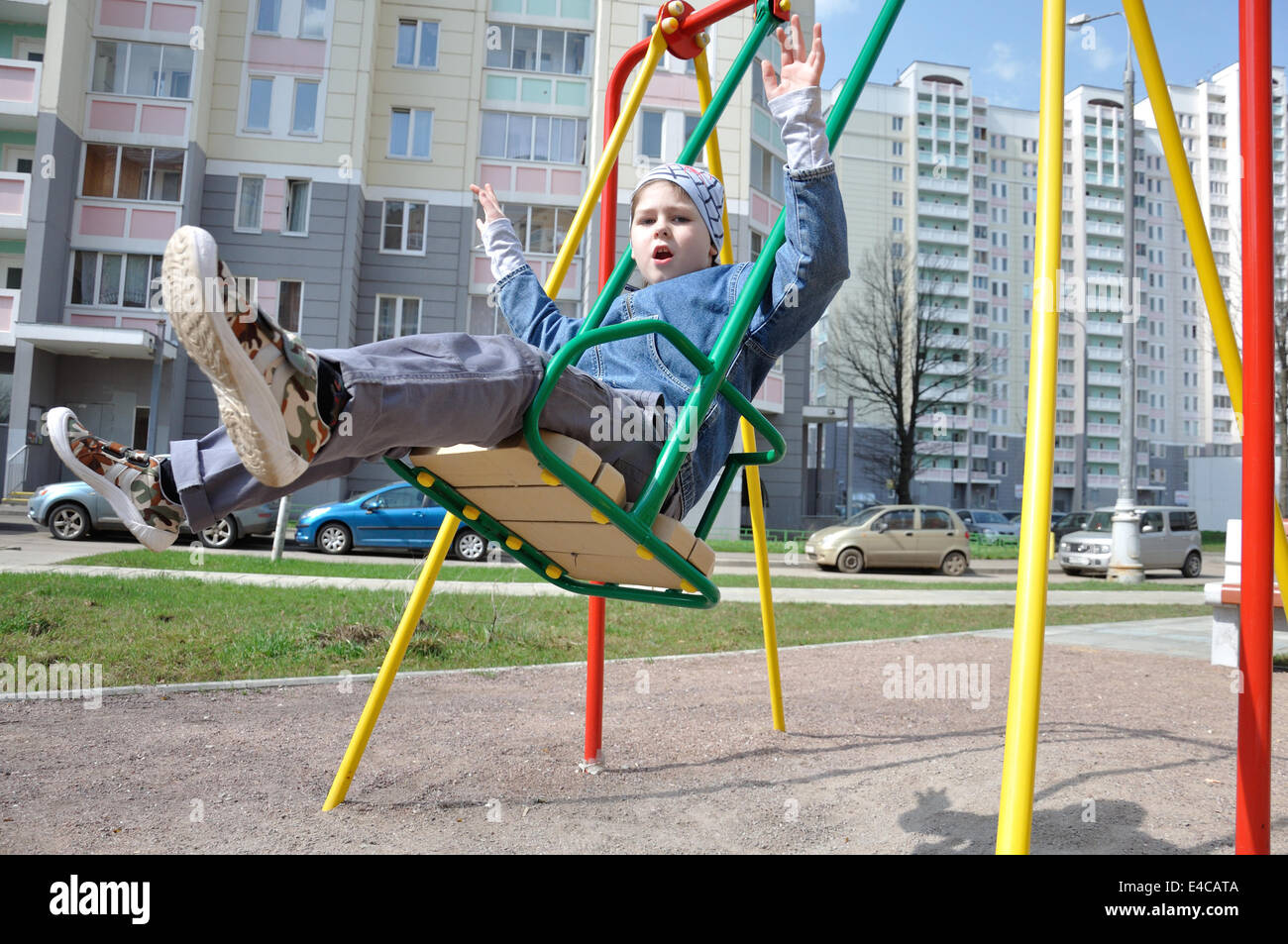 A boy on a swing Stock Photo - Alamy