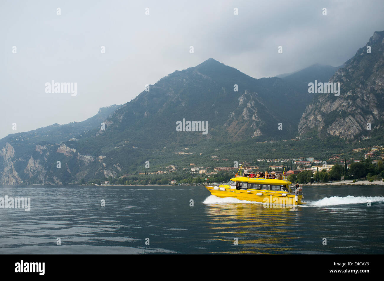 Yellow passenger ferry crossing Lake Garda, Italy Stock Photo - Alamy