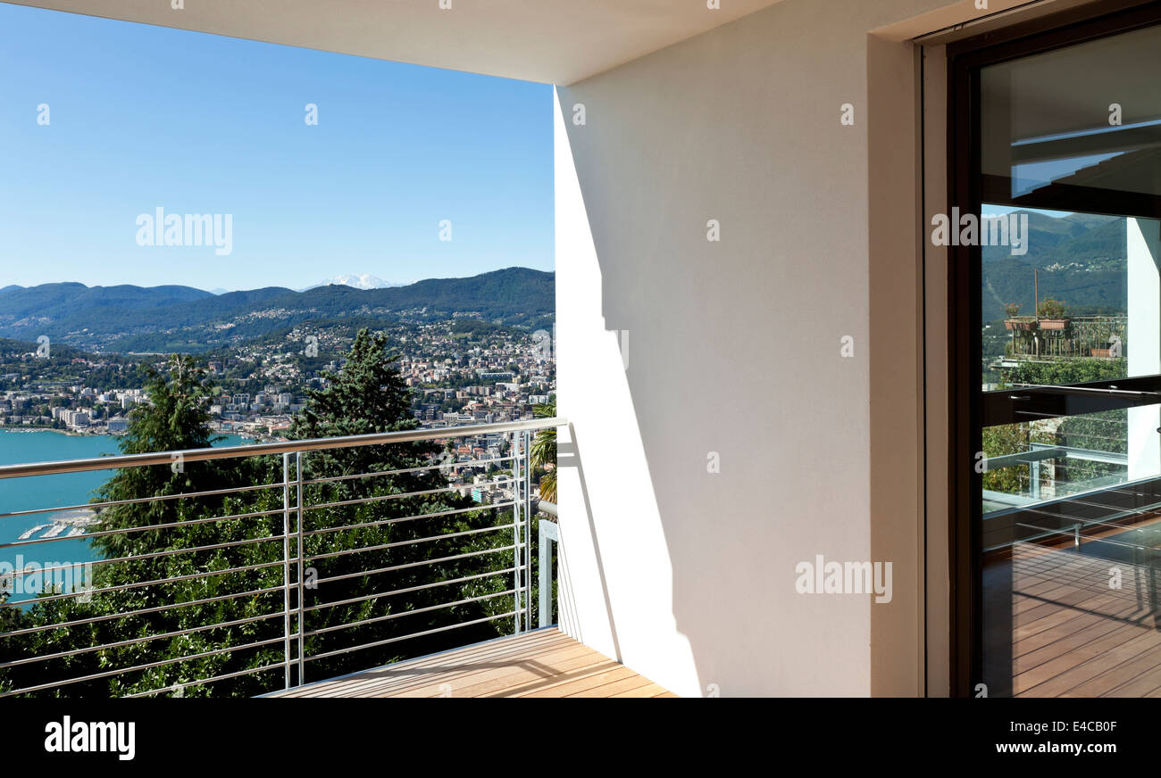 Modern apartment, balcony overlooking the lake Stock Photo - Alamy
