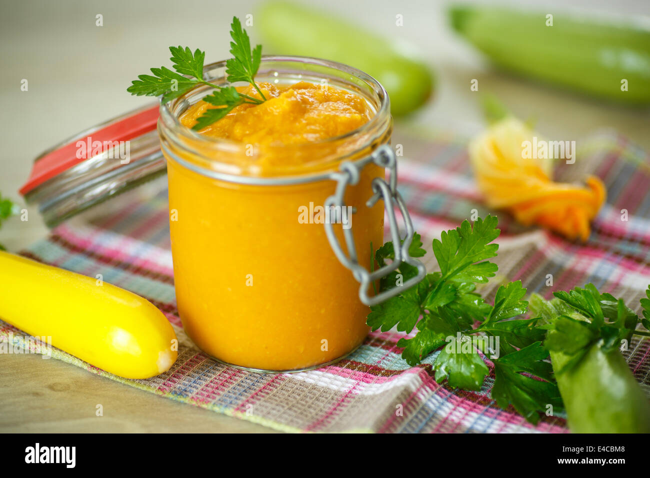 squash puree in a glass jar on the table Stock Photo - Alamy