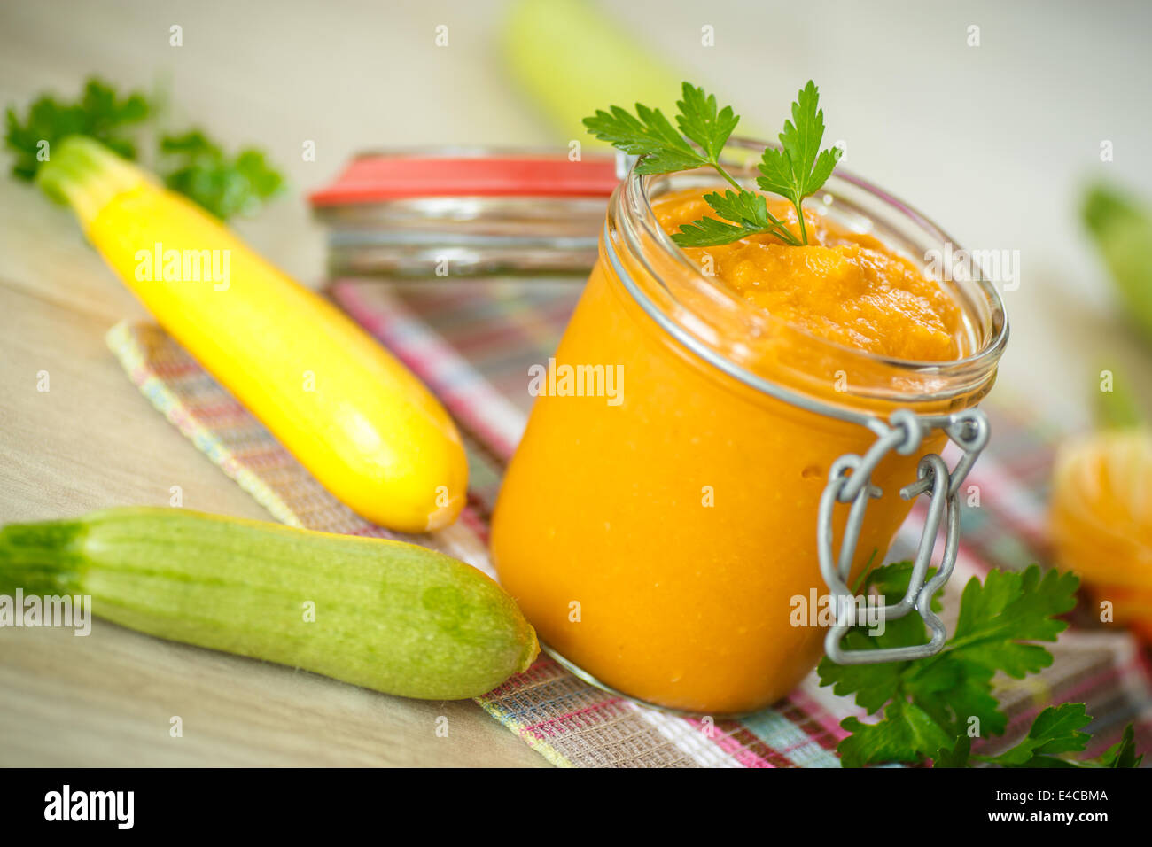squash puree in a glass jar on the table Stock Photo - Alamy