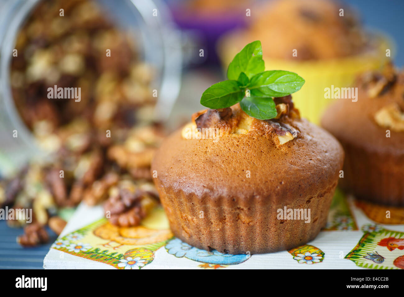 sweet nut muffins with mint on a table Stock Photo - Alamy